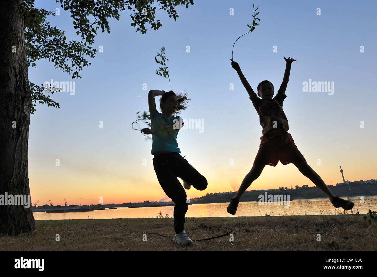 Silhouette children friend play hi-res stock photography and images - Alamy
