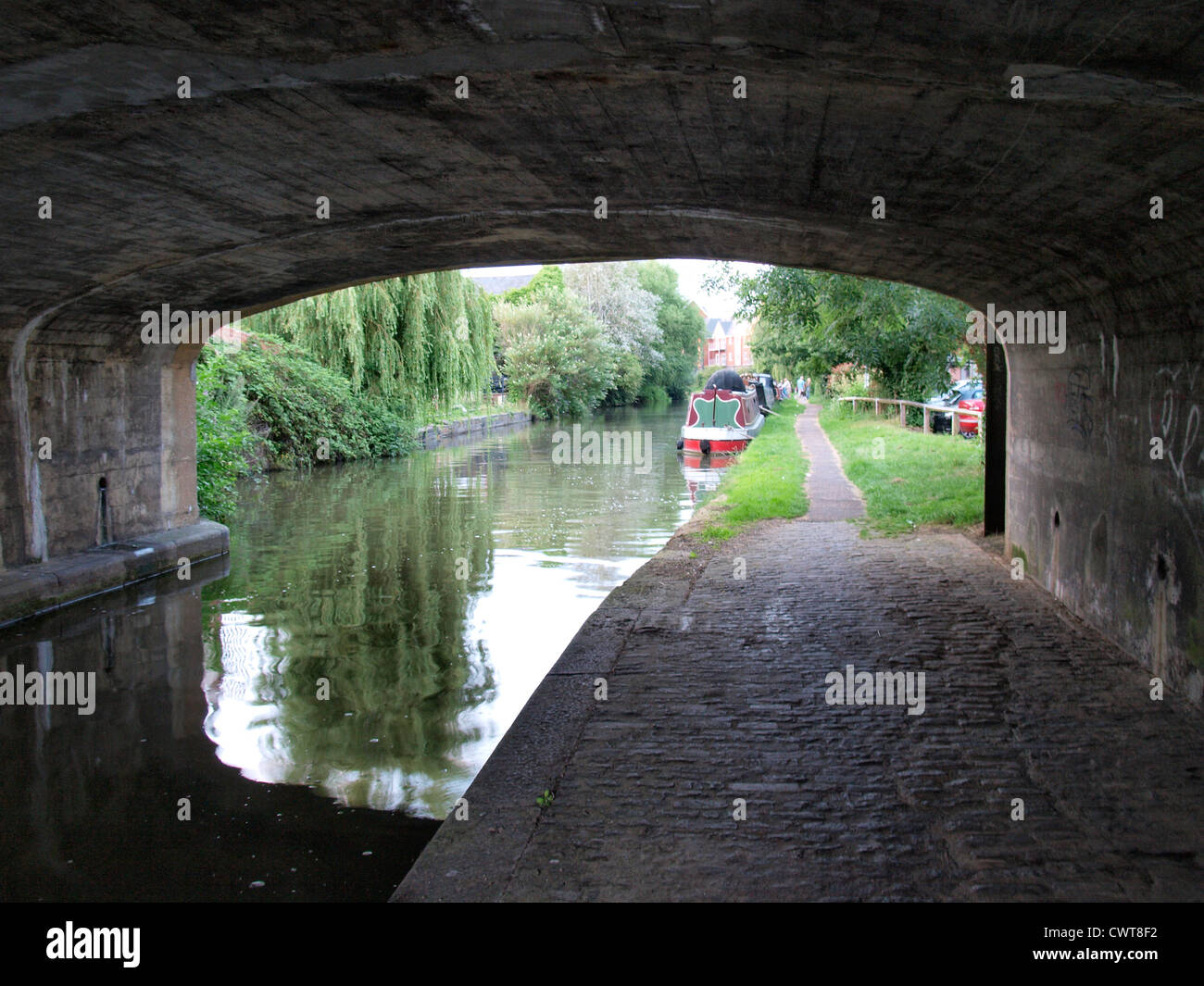 Under a bridge on the Grand Union Canal, Milton Keynes, UK Stock Photo ...