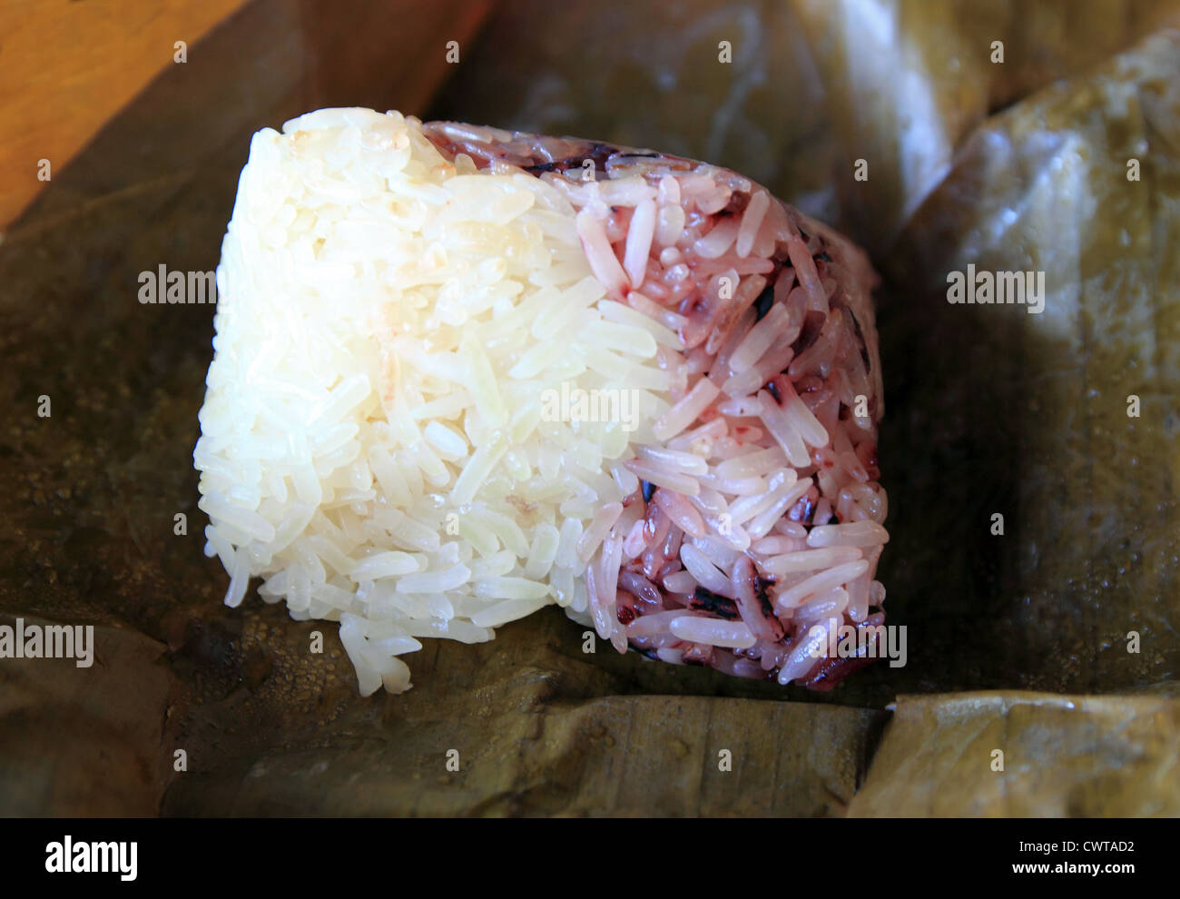 Rice dumpling wrapped in bamboo leaves hi-res stock photography and ...