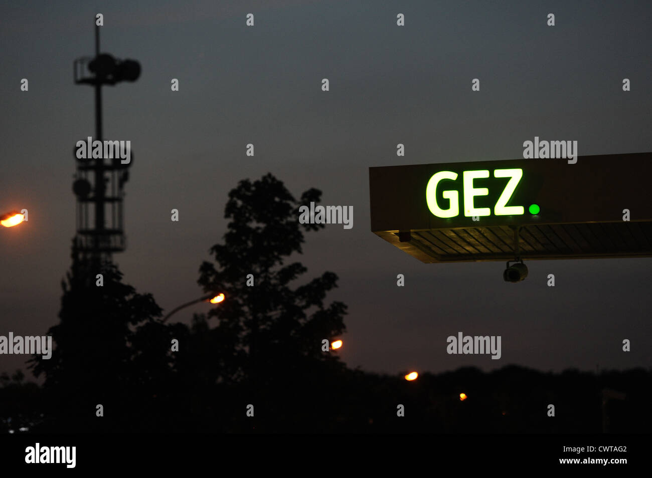 Word GEZ at roofing at night Stock Photo - Alamy