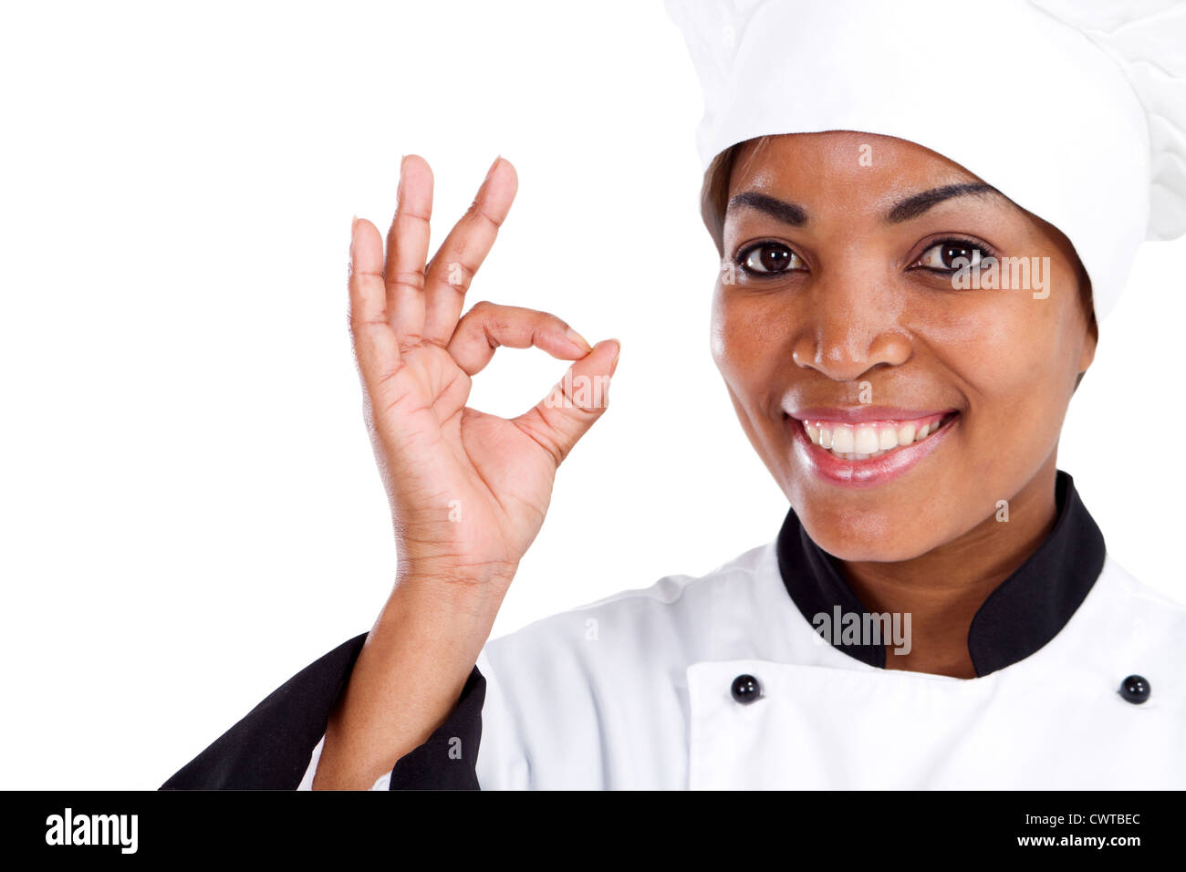 african american female chef giving delicious hand sign on white Stock ...
