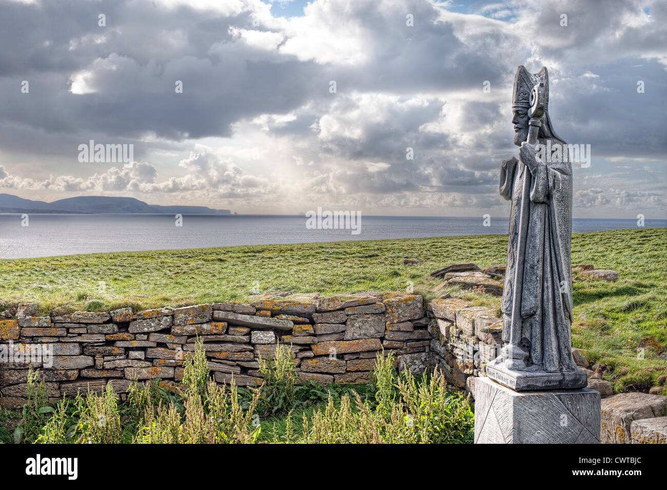 A statue of St Patrick, the patron saint of Ireland, stands among the ...