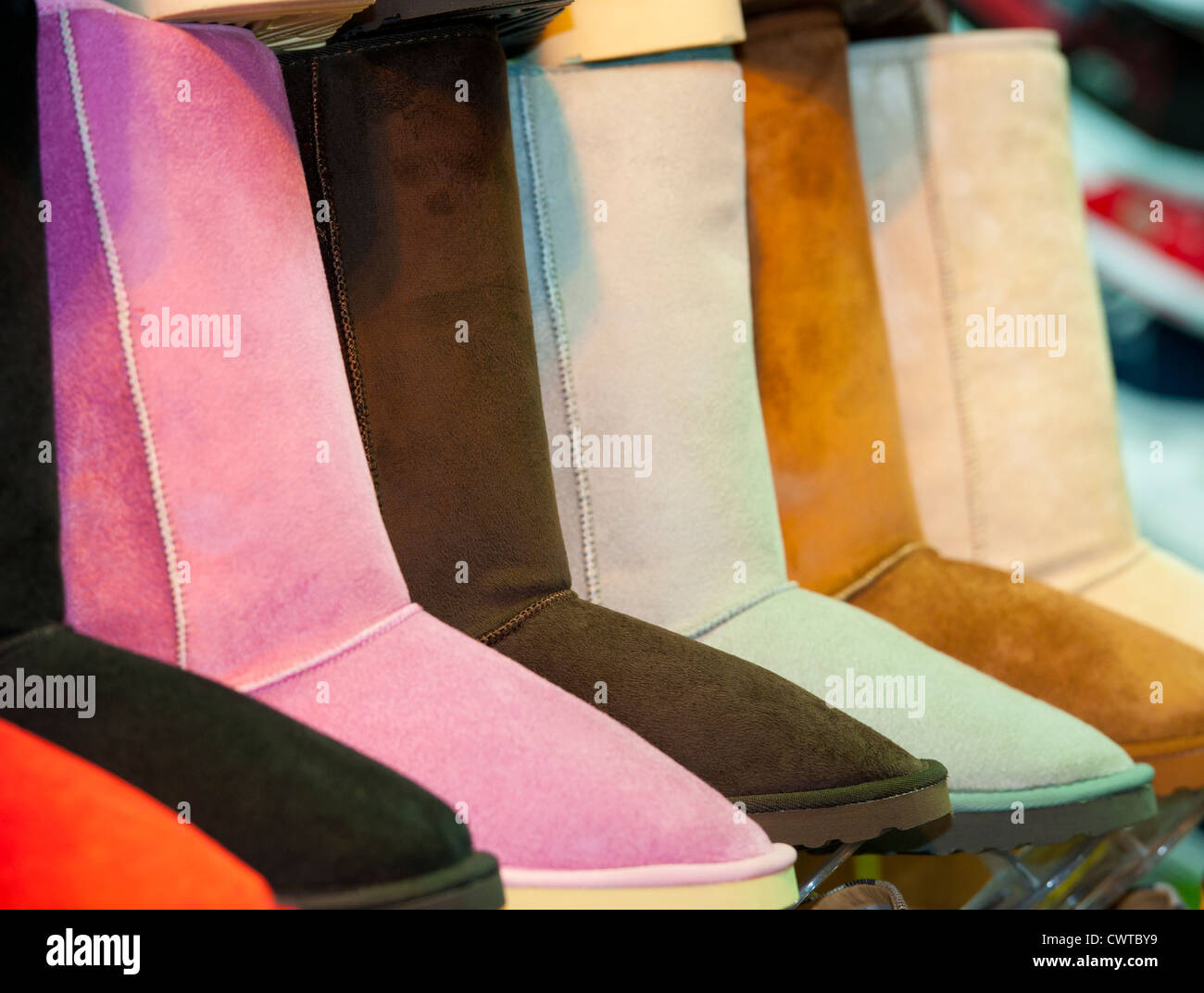 Selection of colorful boots at a market shoe stall Stock Photo - Alamy