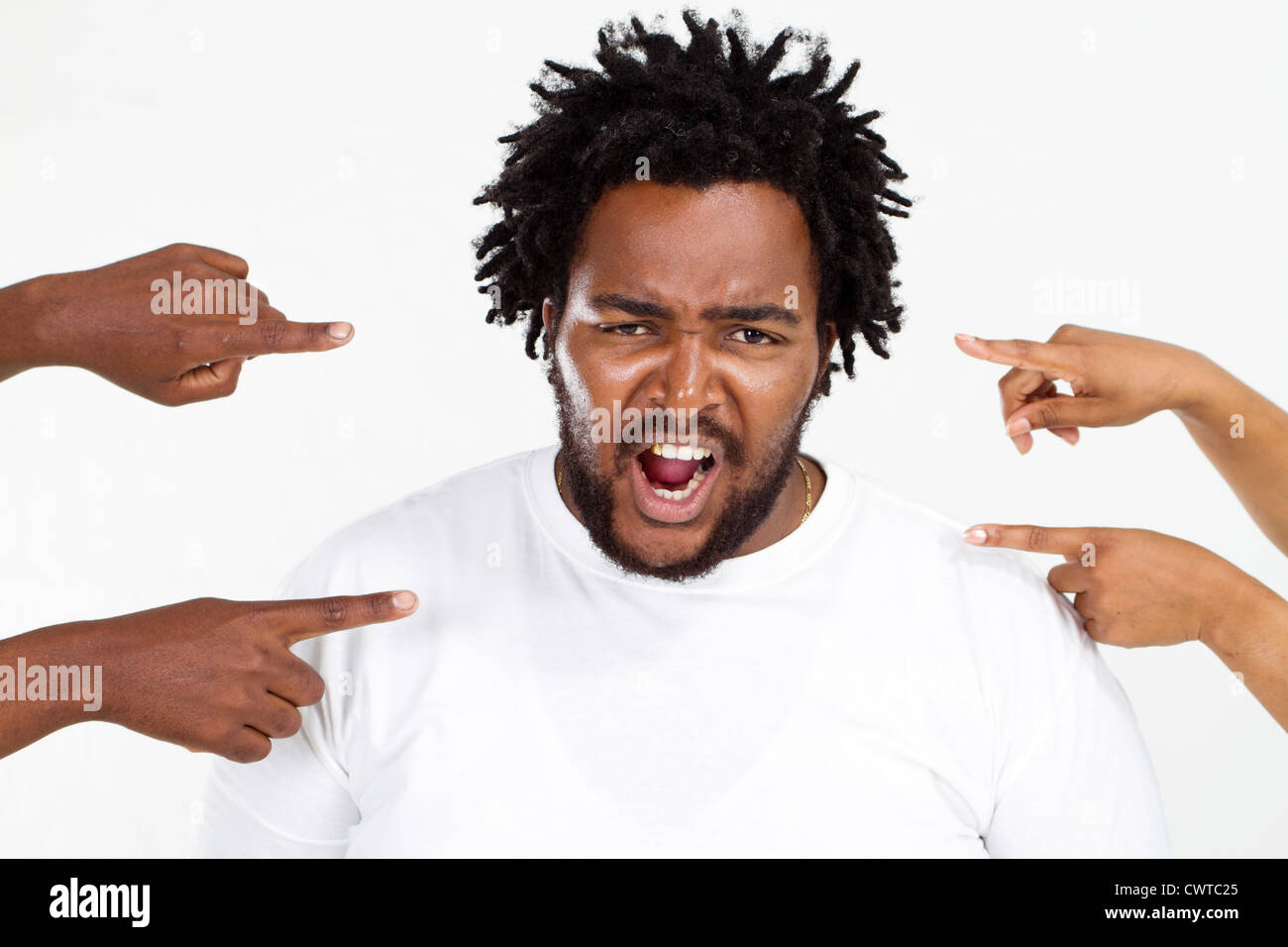 fingers pointing at angry overweight african american man Stock Photo ...