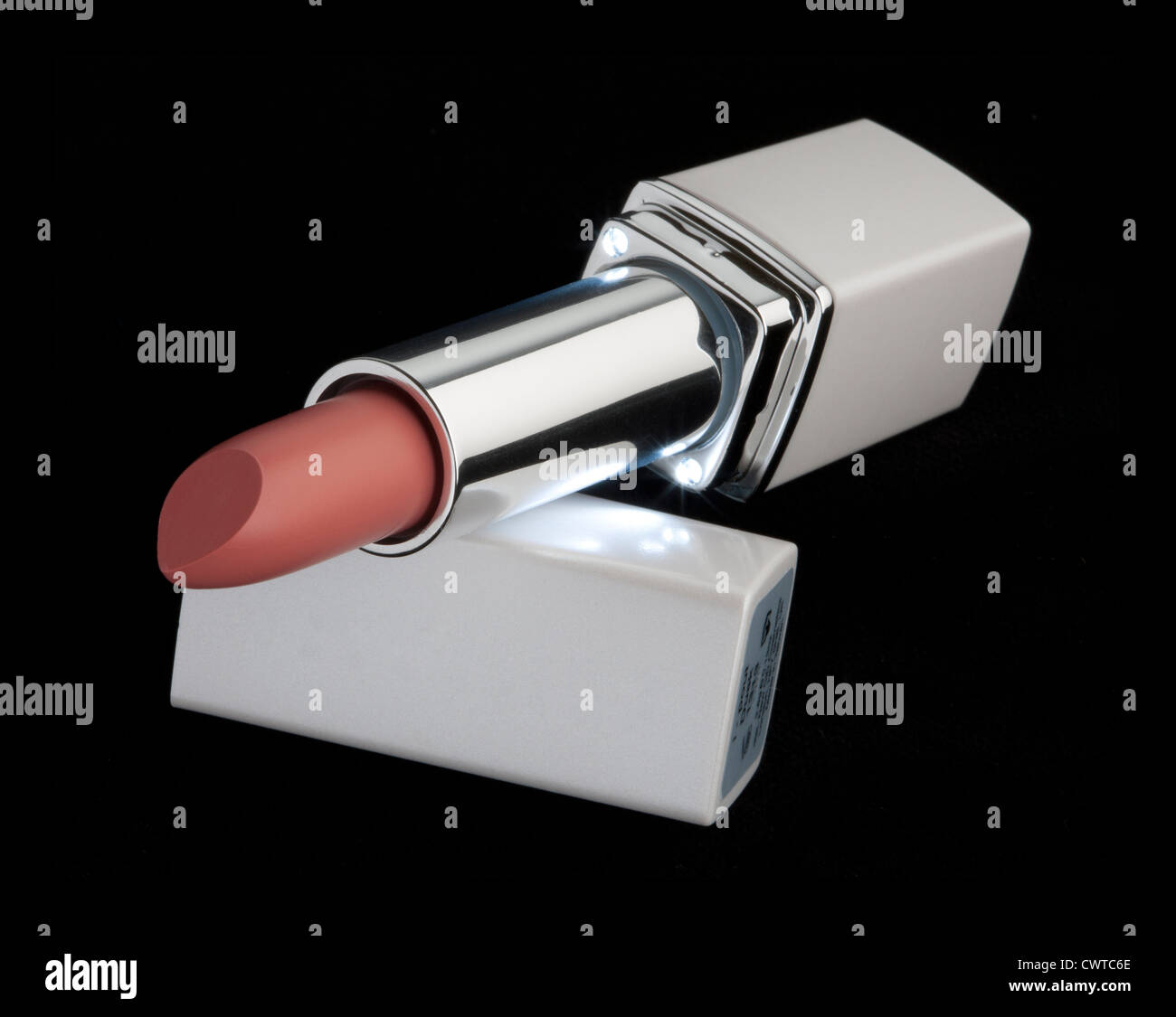 Lipstick with LED lights in casing to light up lips in a dark ...