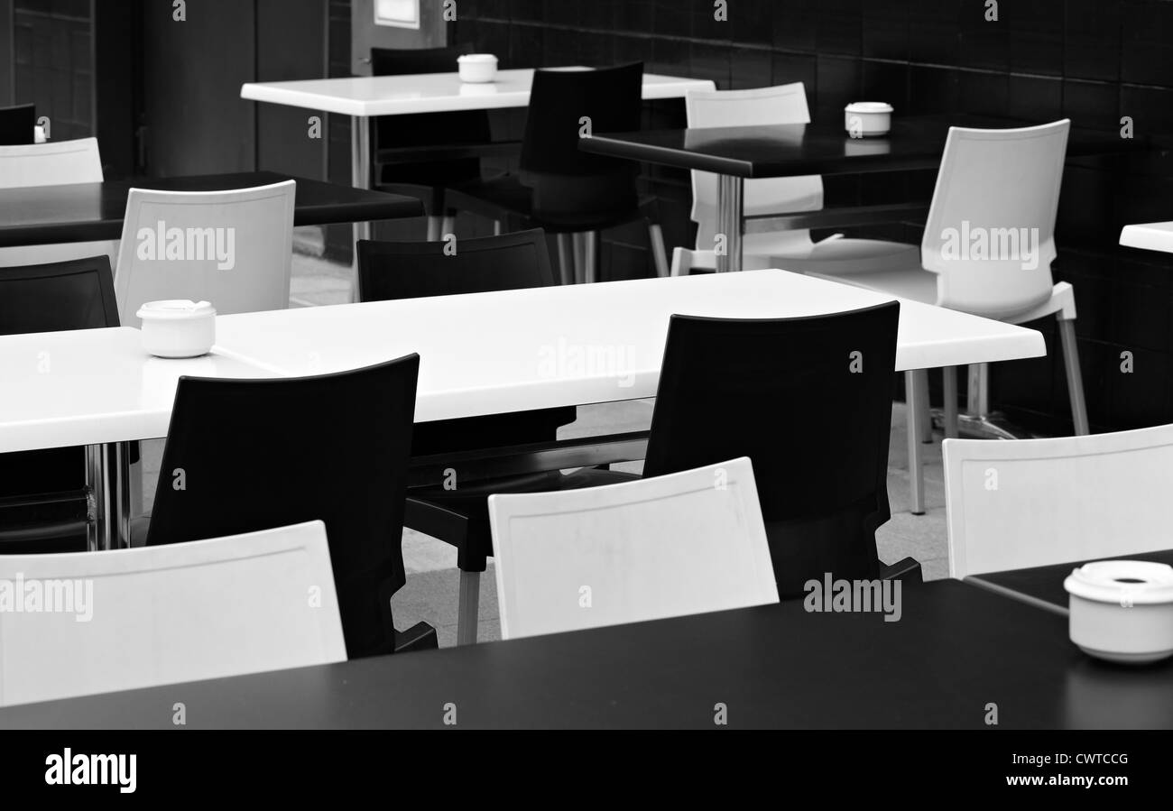 Plastic tables and chairs Black and White Stock Photos & Images - Alamy