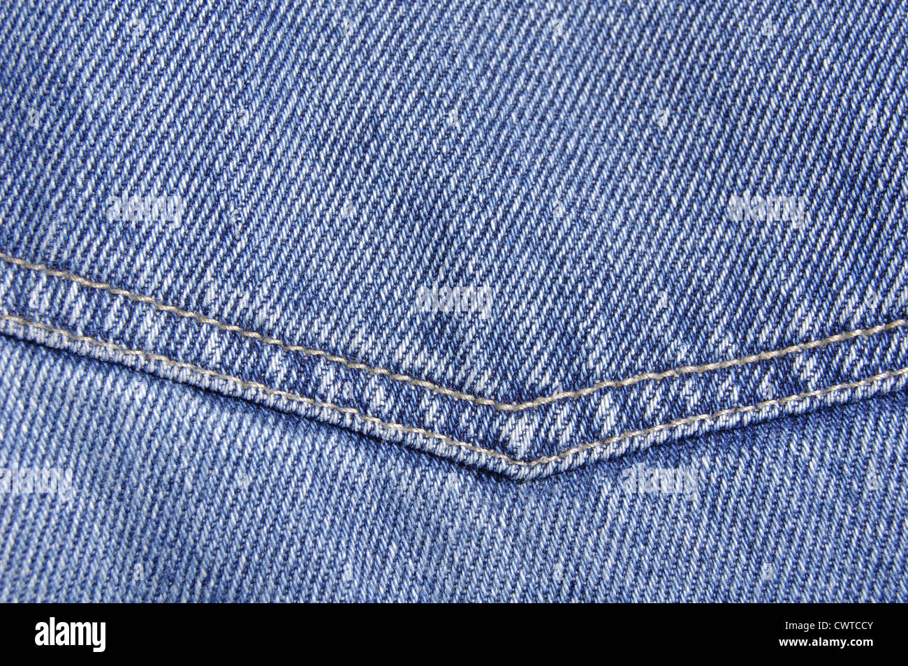 Close up of blue denim showing pocket seam Stock Photo - Alamy