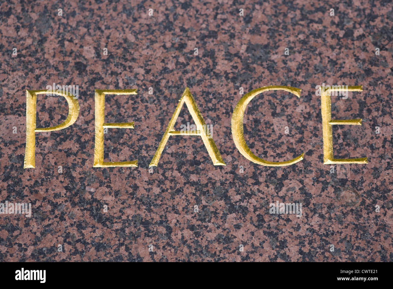 The Word Peace written in Gold Stock Photo - Alamy