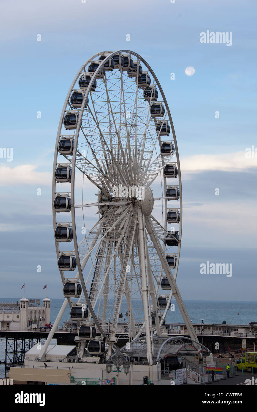 Brighton wheel and moon Stock Photo - Alamy