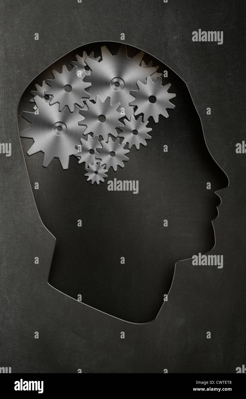 Profile of a man's head with a representation of the brain as cogs and ...