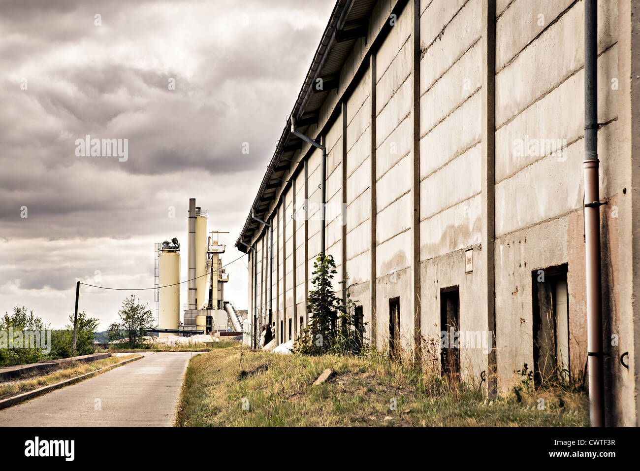 An old small factory in front of sky Stock Photo - Alamy