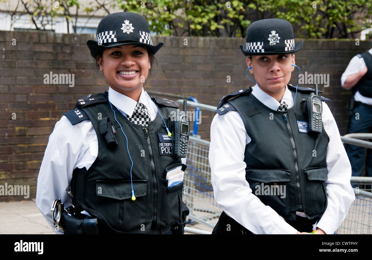 Two Metropolitan policewomen on the beat together in London Stock Photo ...