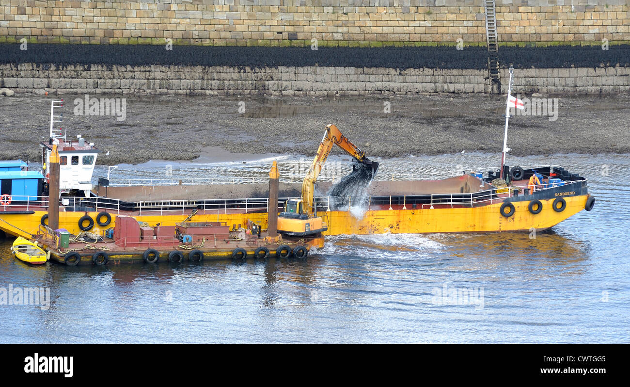 The Whitby Dredger ‘Sandsend’ dredging near the harbour entrance whitby ...