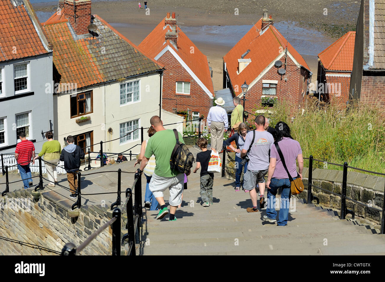 tourists walking down Whitby steps north Yorkshire england uk Stock ...