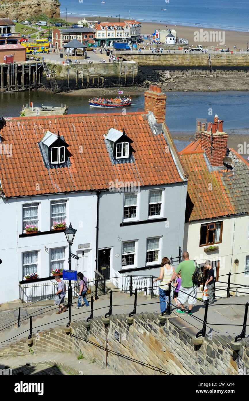tourists on the whitby steps north yorkshire england uk Stock Photo - Alamy