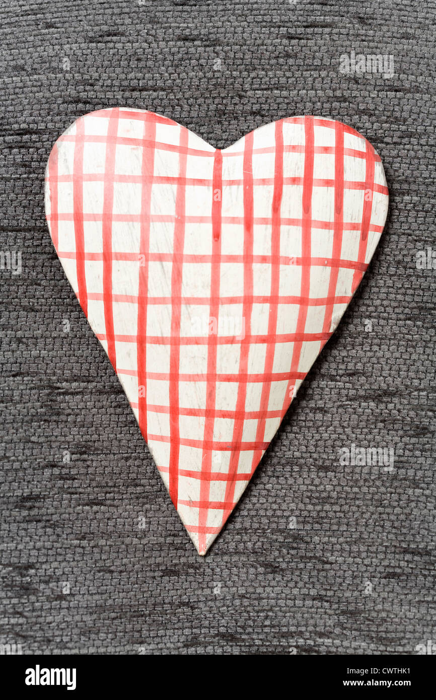 Checkered heart on gray textile Stock Photo - Alamy