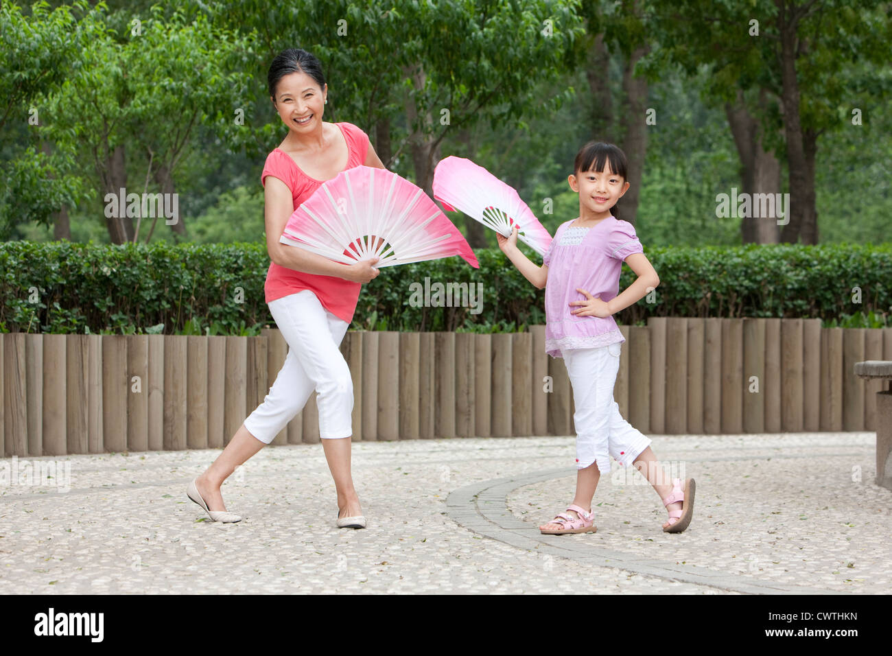 Grandmother dancing with granddaughter Stock Photo - Alamy