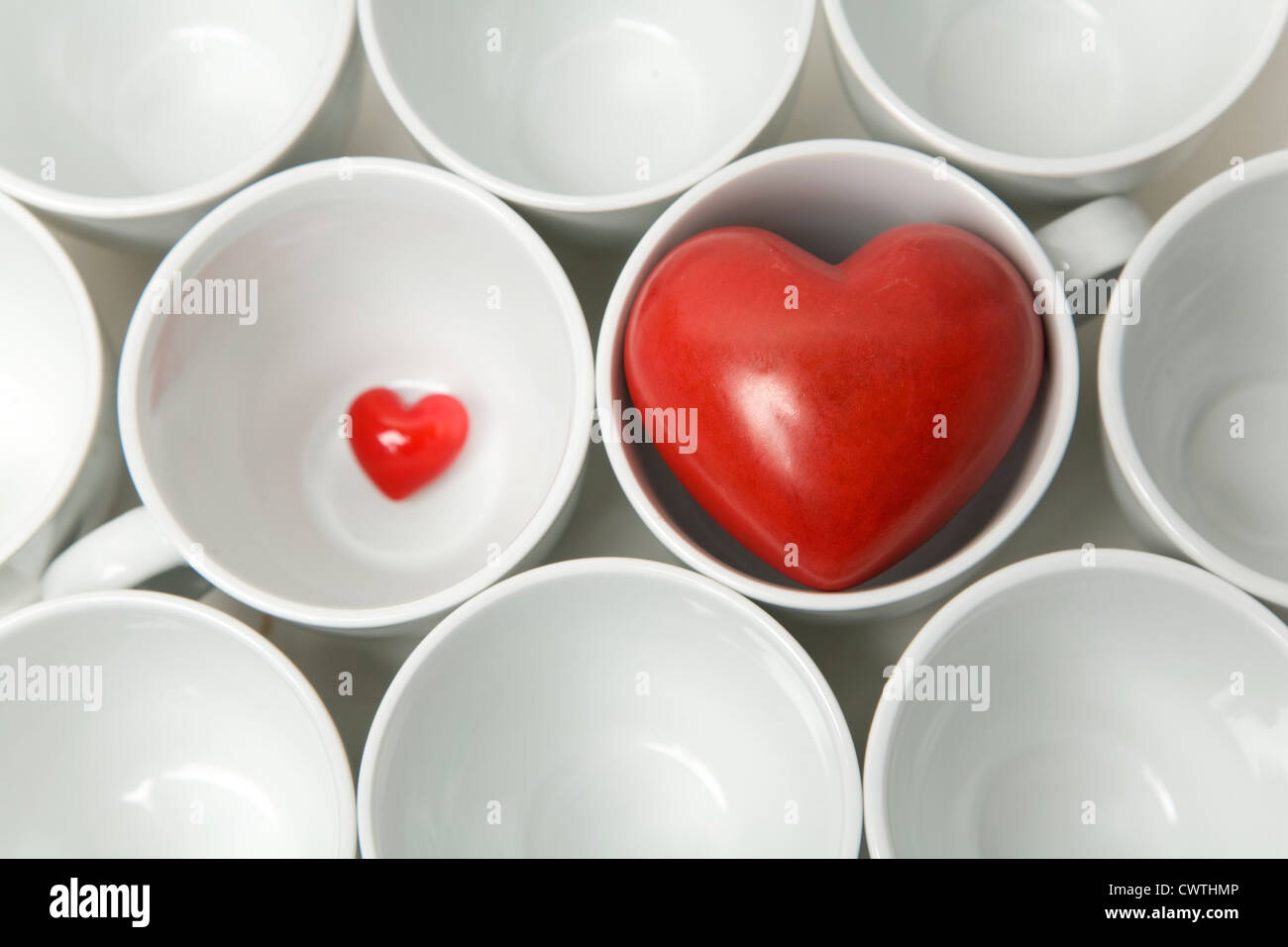 Small and large heart with coffee cups Stock Photo - Alamy