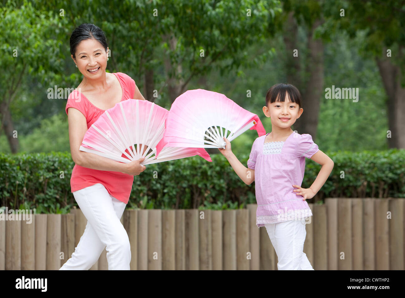 Grandmother dancing with granddaughter Stock Photo - Alamy