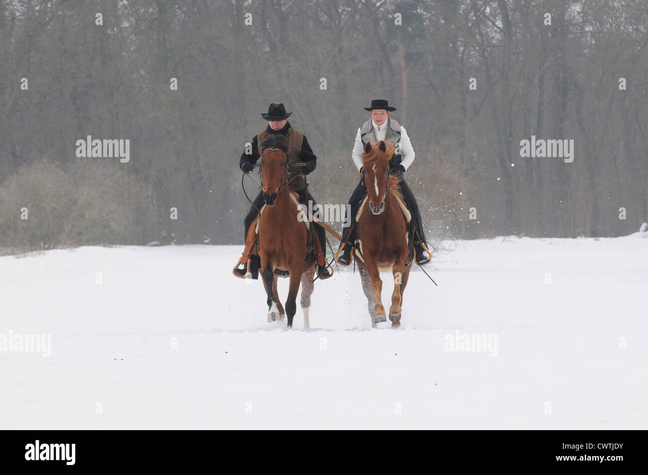 2 riders with horse Stock Photo - Alamy