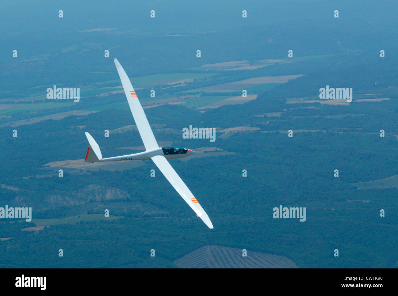 Aerial view of glider plane Duo Discus flying near aerodrome of Vinon ...