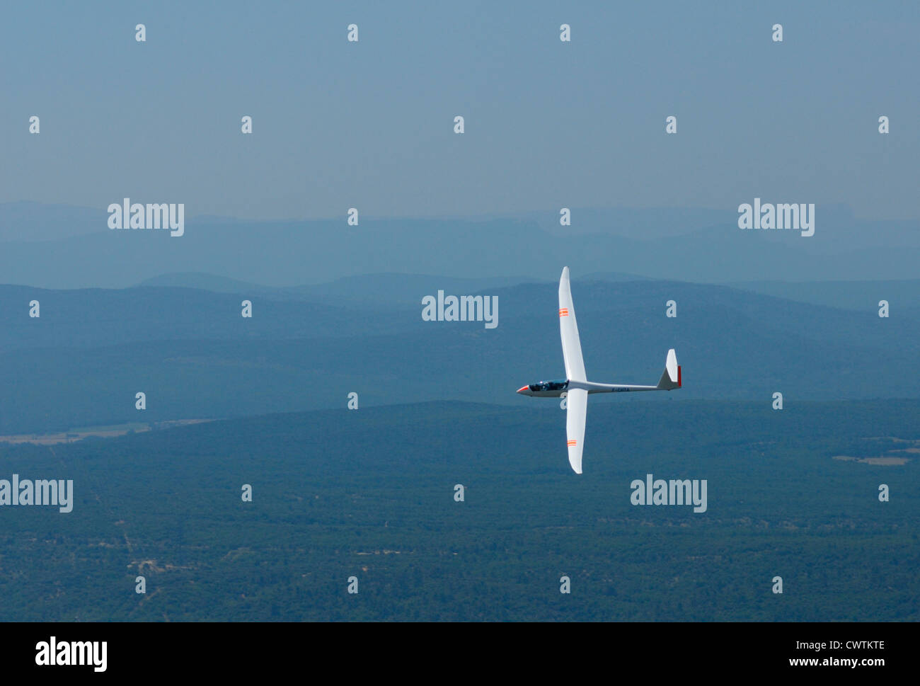 Aerial view of glider plane Duo Discus flying near aerodrome of Vinon ...