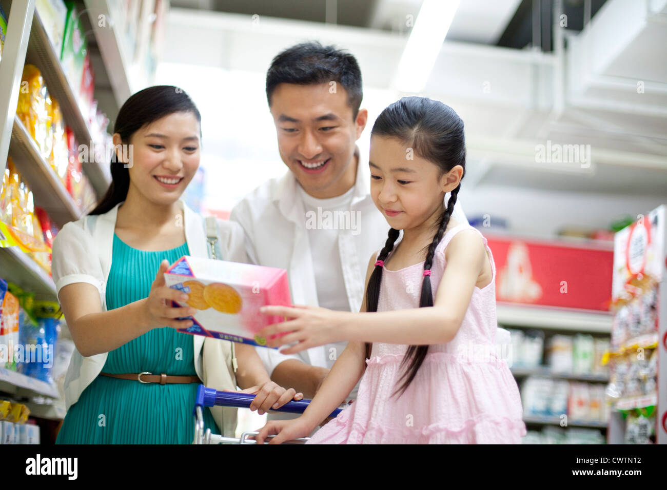 Family shopping in supermarket Stock Photo - Alamy