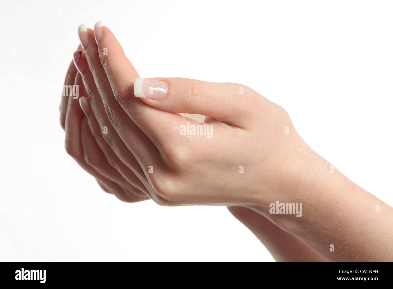 Woman's cupped hands Stock Photo - Alamy