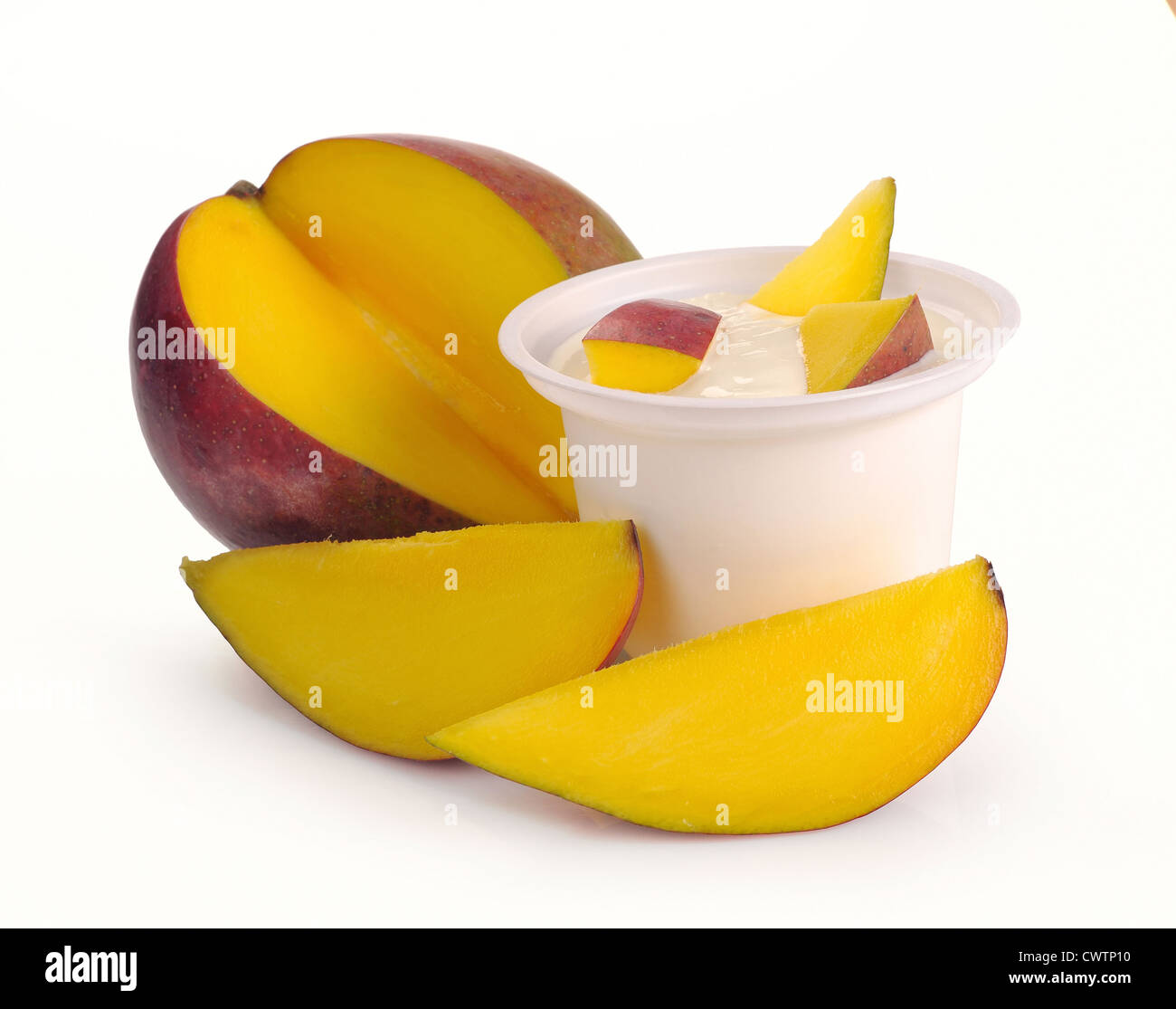 yoghurt with mango and pieces on a white background Stock Photo - Alamy