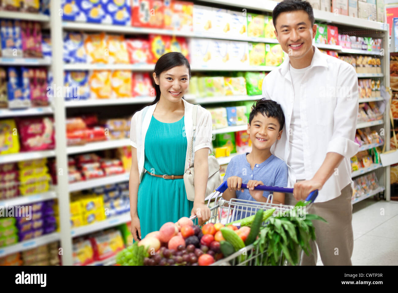 Family shopping in supermarket Stock Photo - Alamy
