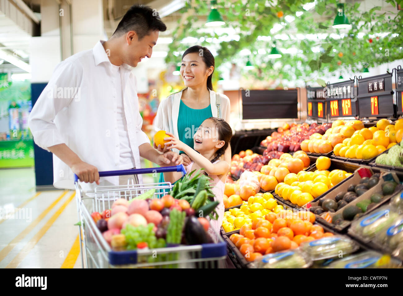 Family shopping in supermarket Stock Photo - Alamy