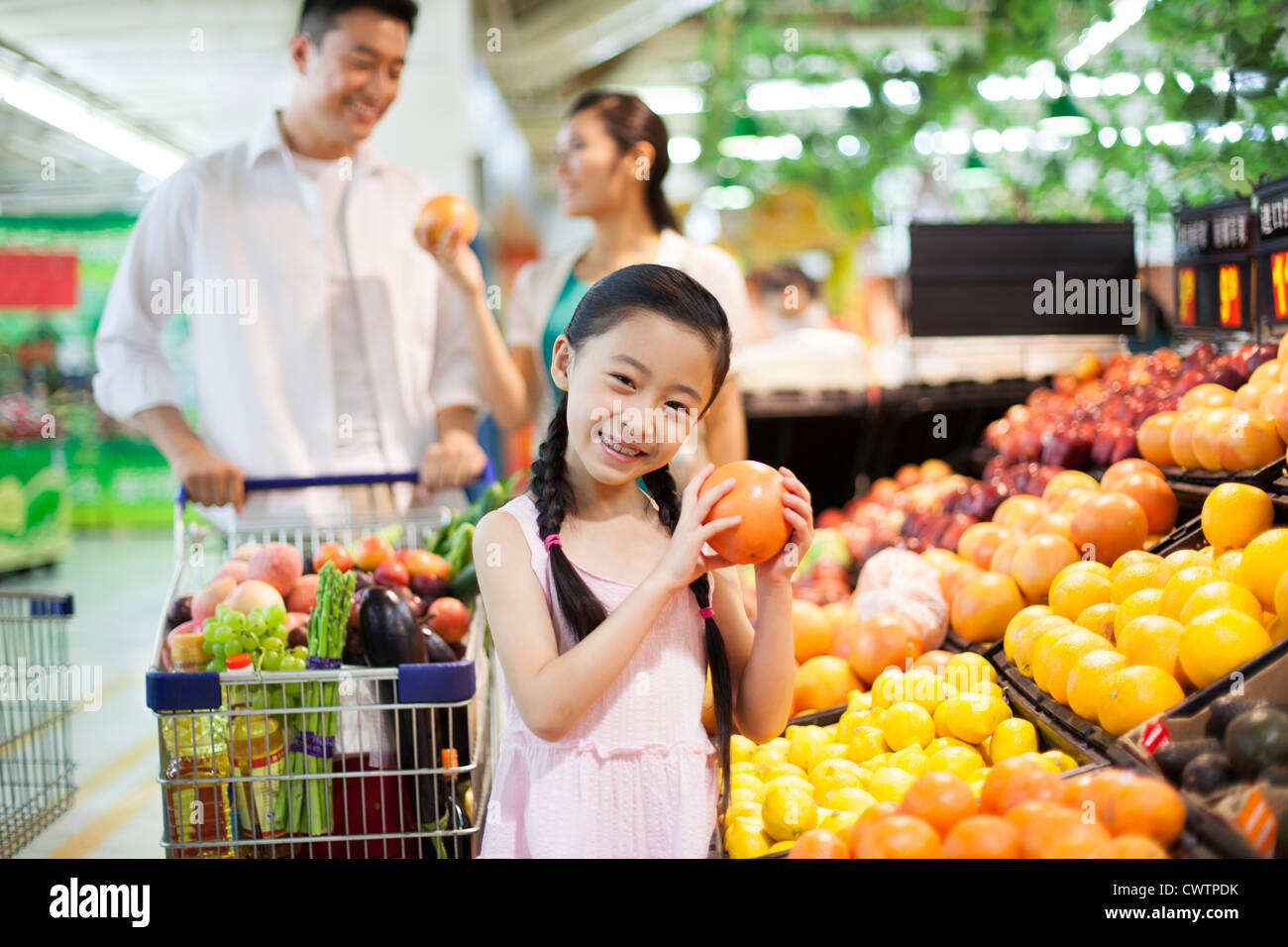 Family shopping in supermarket Stock Photo - Alamy