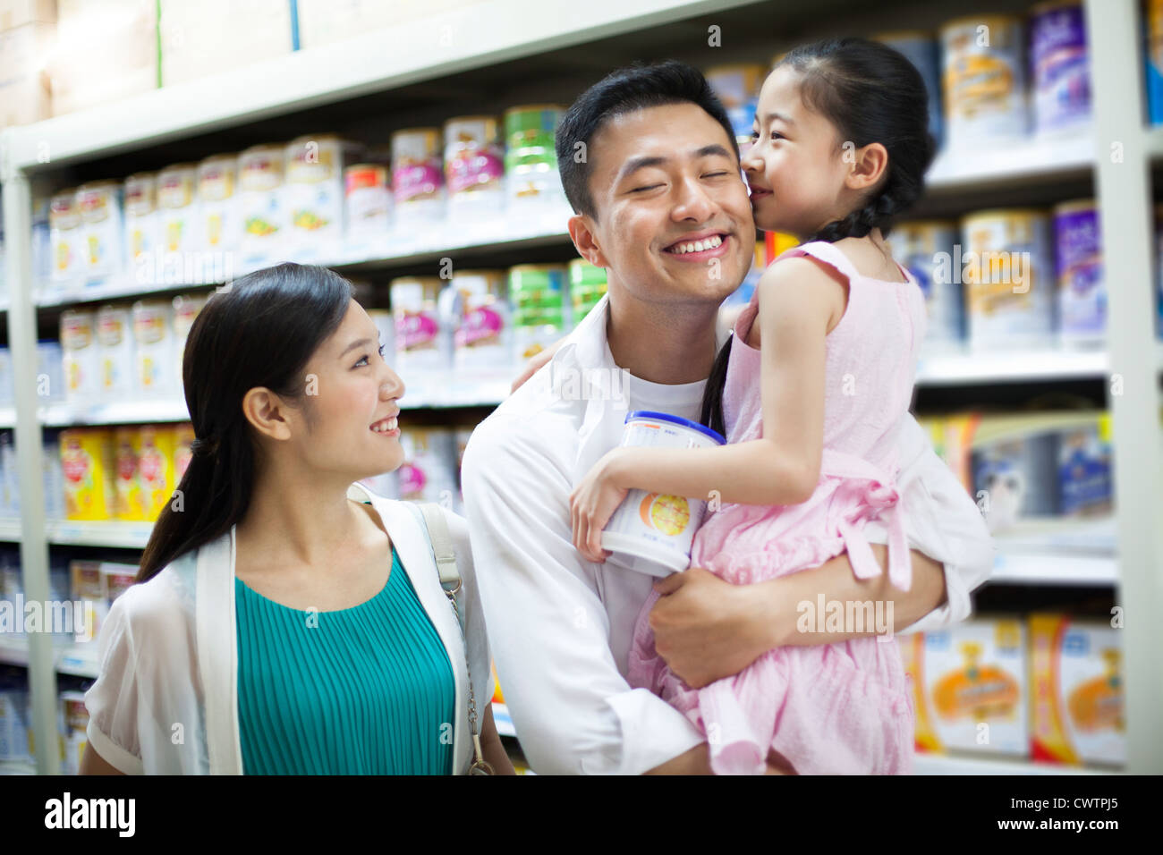 Family shopping in supermarket Stock Photo - Alamy