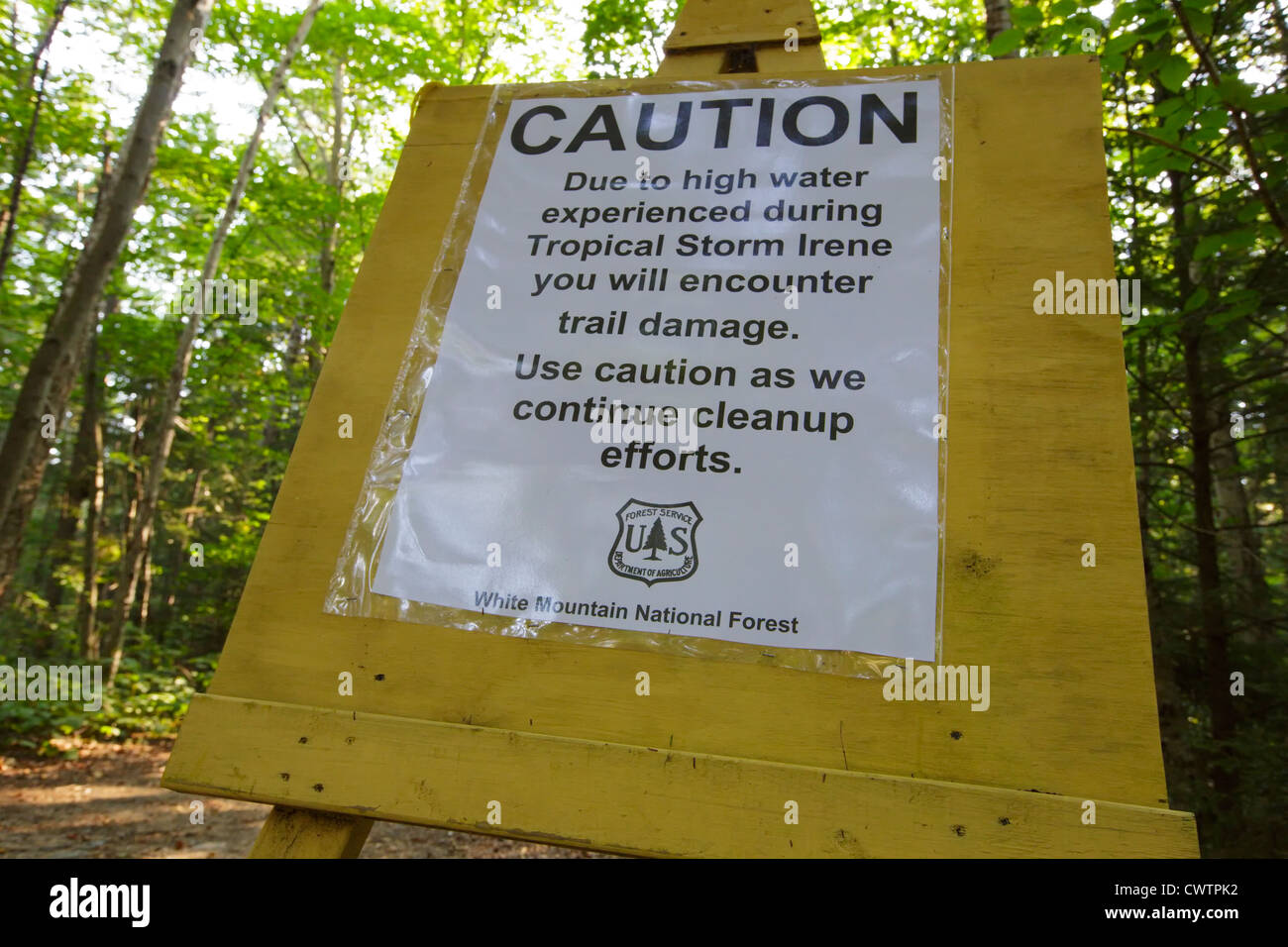 Caution sign along hiking trail Stock Photo - Alamy