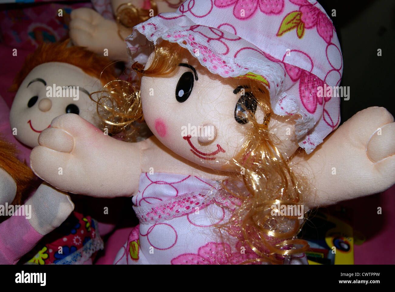 Doll Girl smiling cutely closeup view Stock Photo - Alamy