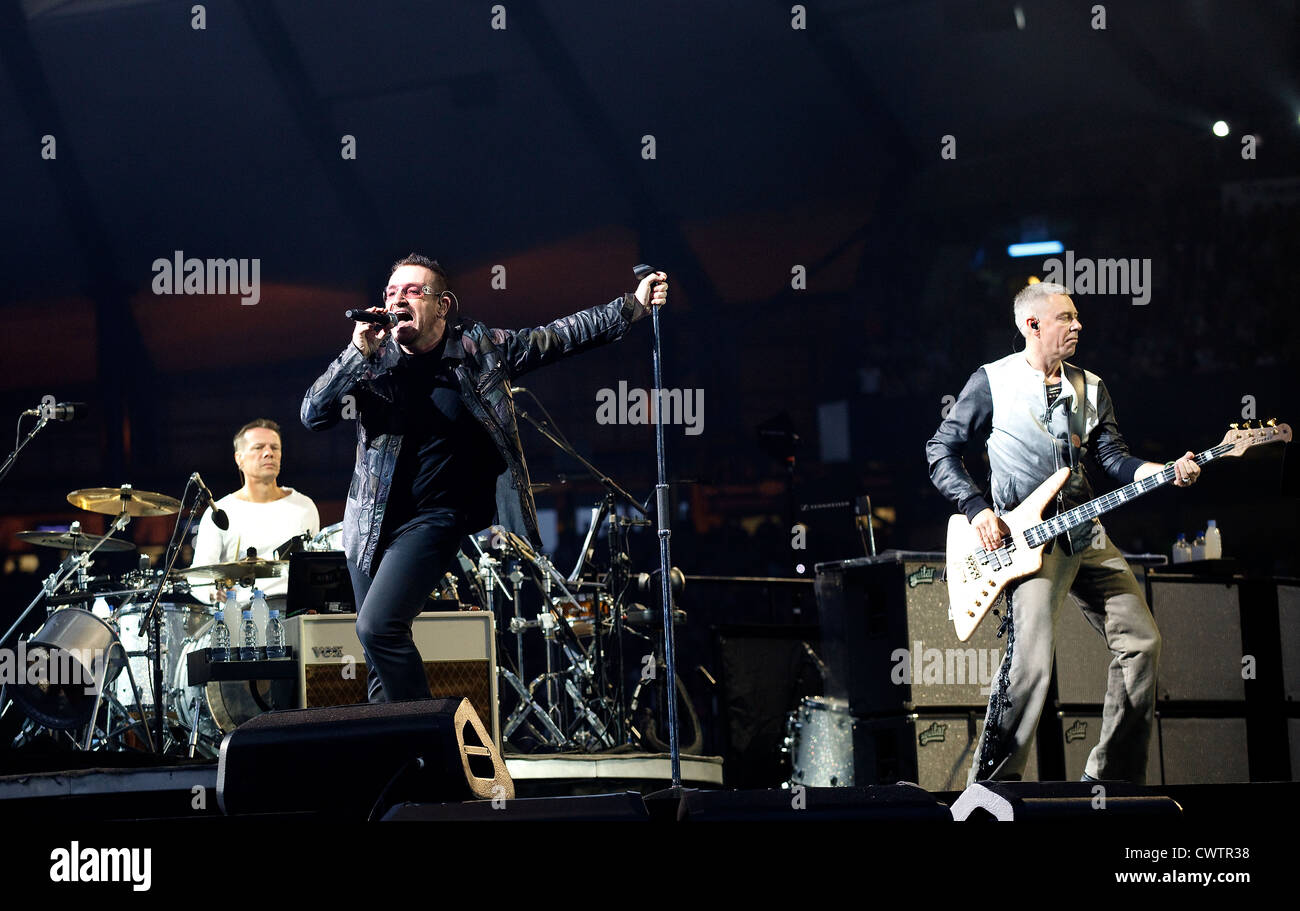 Larry Mullen Jr, Bono and Adam Clayton performing during The U2 360 ...
