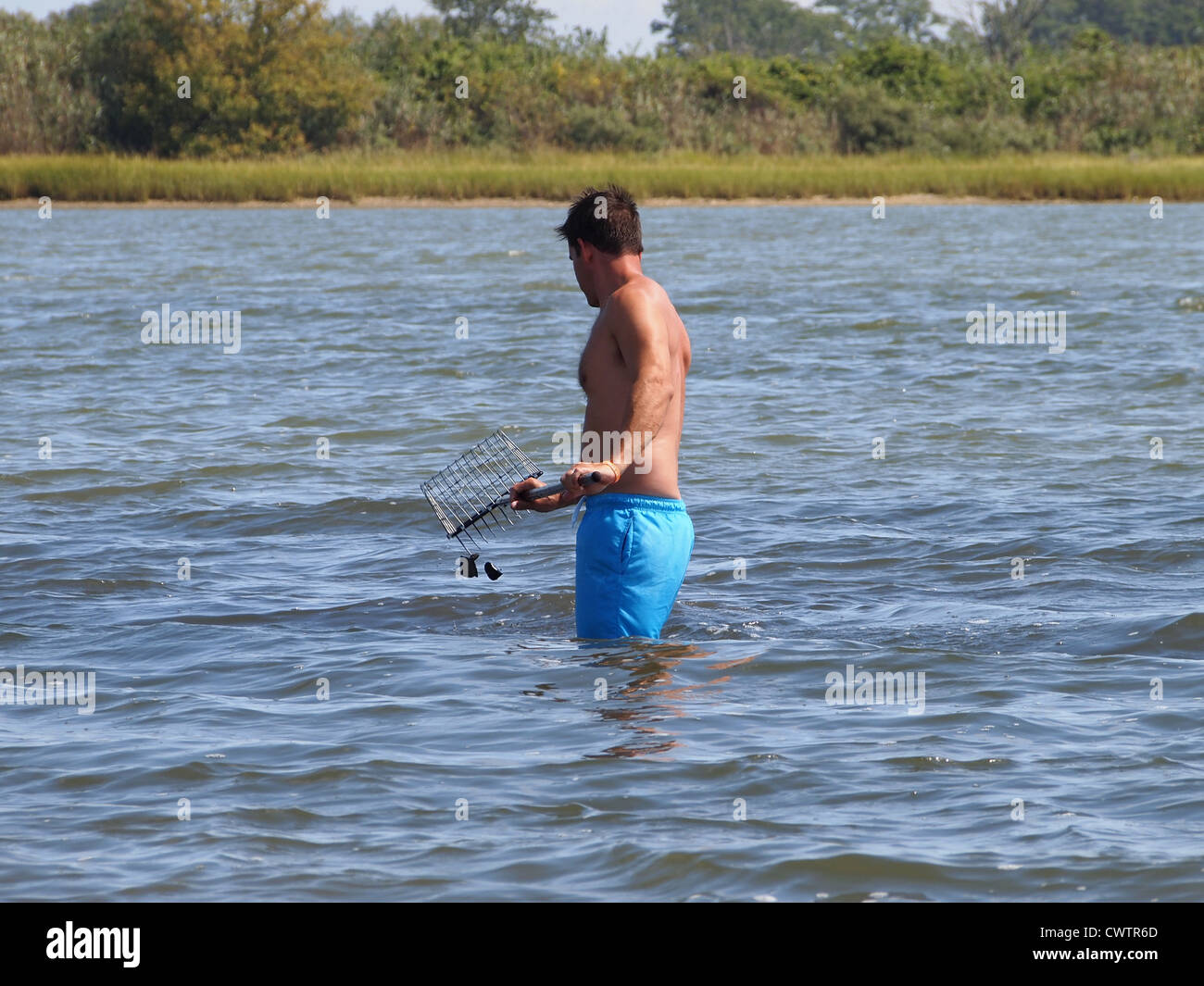 Clam digging hi-res stock photography and images - Alamy