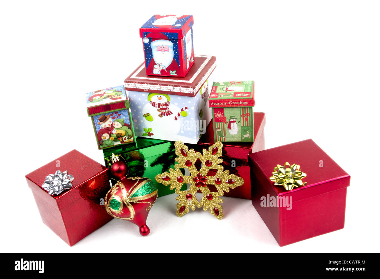Boxed and decorated Christmas presents isolated on white background ...