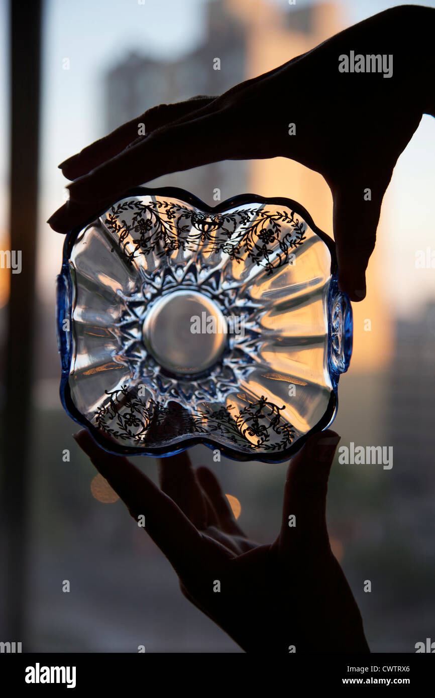 GLASS HELD WITH HANDS Stock Photo - Alamy