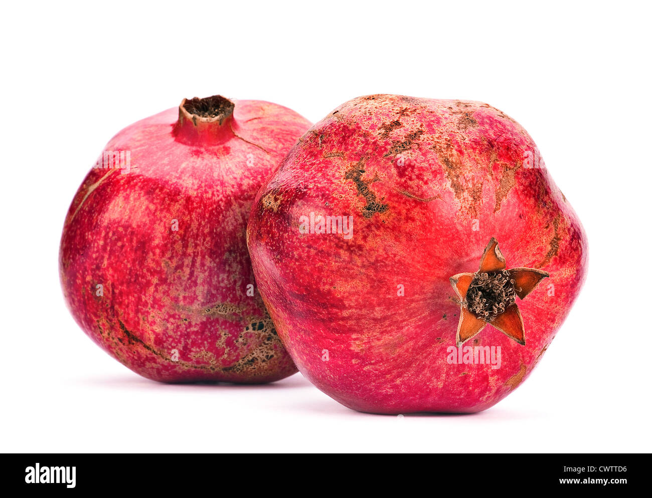 Pomegranate fruit closeup on white background Stock Photo - Alamy
