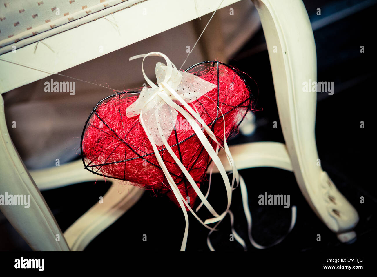 Decorative heart at a chair Stock Photo - Alamy