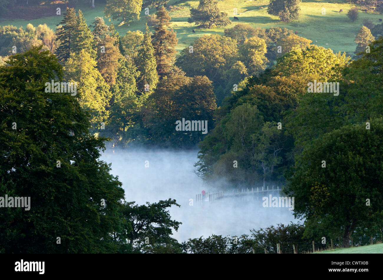 Morning mist on Coniston water at "Monk Coniston" jetty at the north of ...
