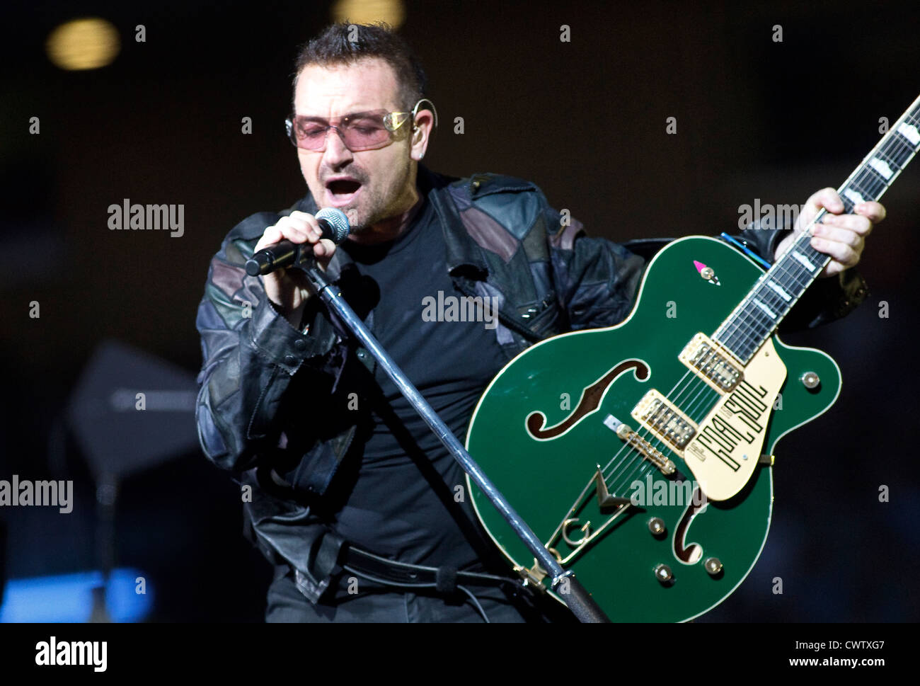 Bono performing during The U2 360° Tour at Hampden Park, Glasgow ...
