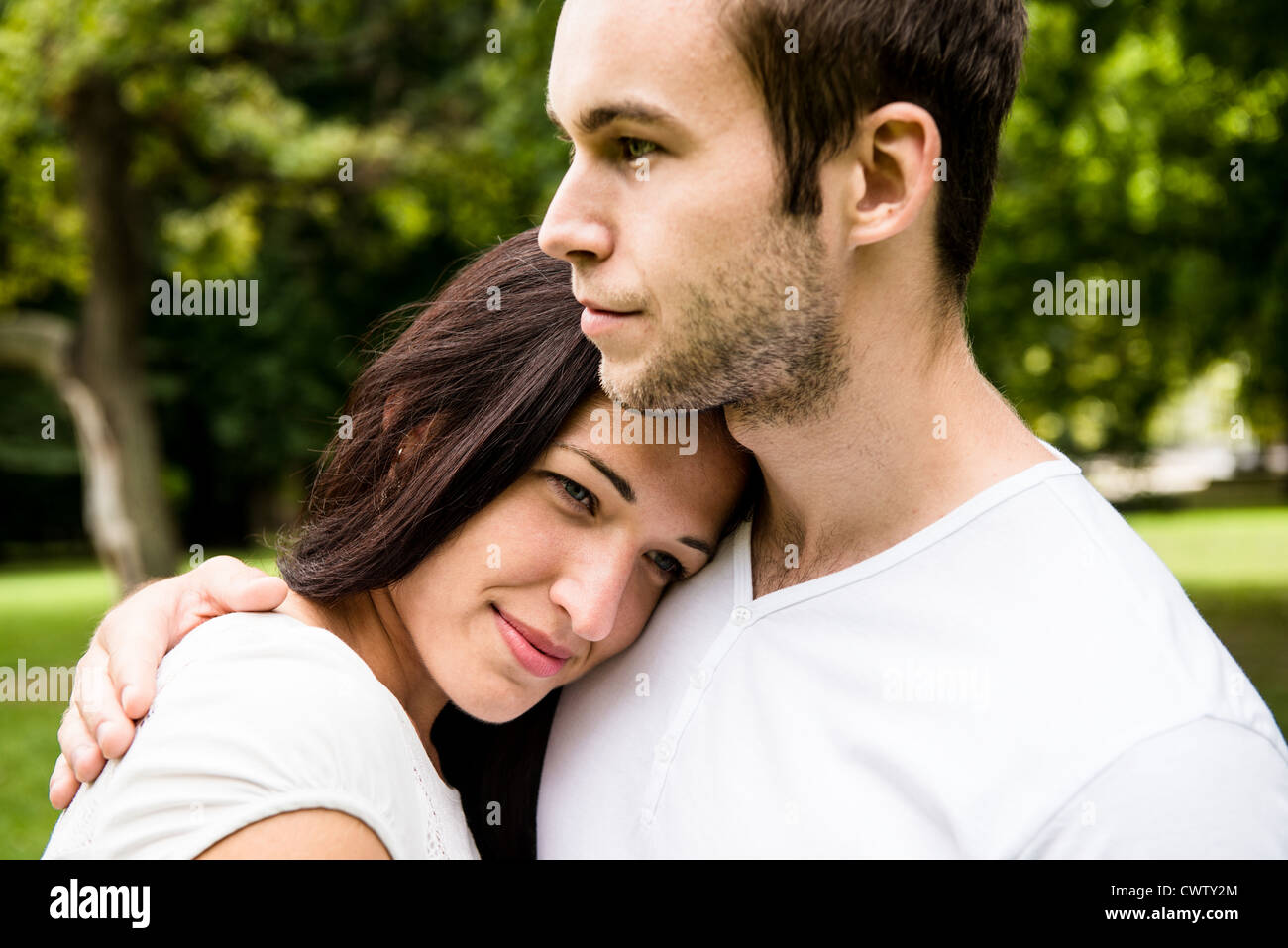 Romantic moments - young couple together, woman's head laid on men's ...