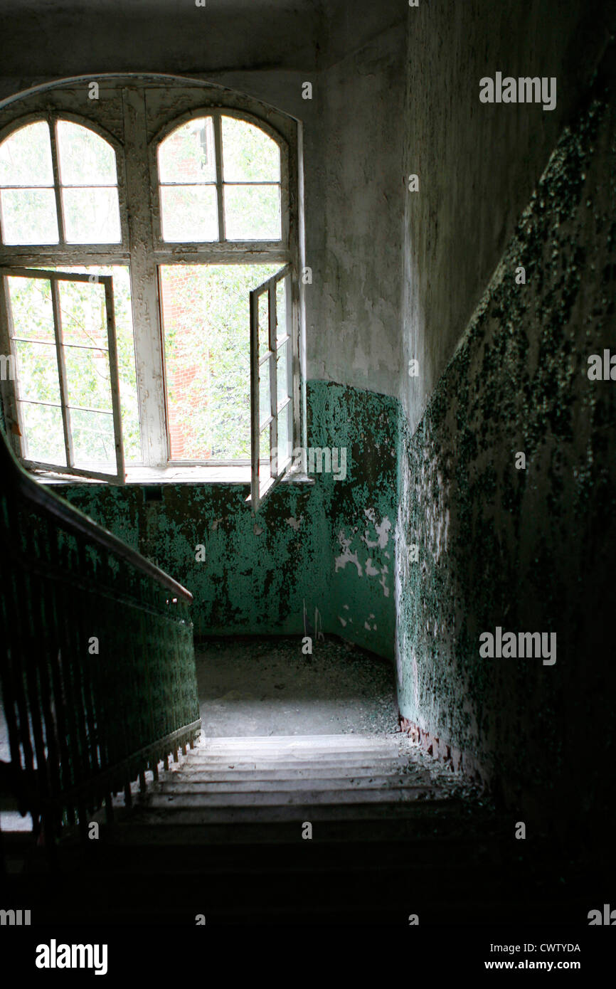 Staircase in a run down building Stock Photo - Alamy