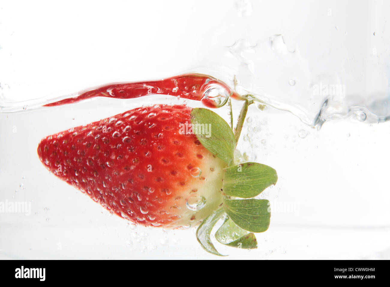 Strawberry in water Stock Photo - Alamy