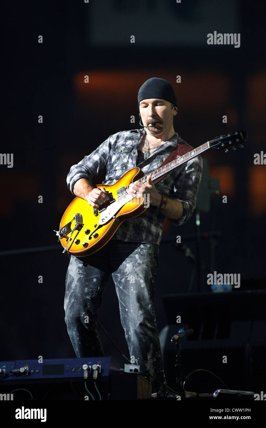 The Edge performing during The U2 360° Tour Stock Photo - Alamy