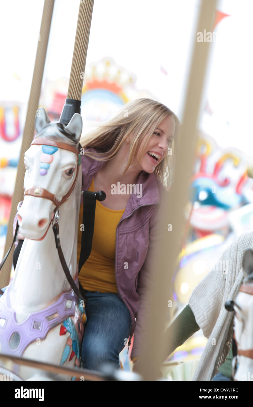 Carefree woman fun on carousel hi-res stock photography and images - Alamy