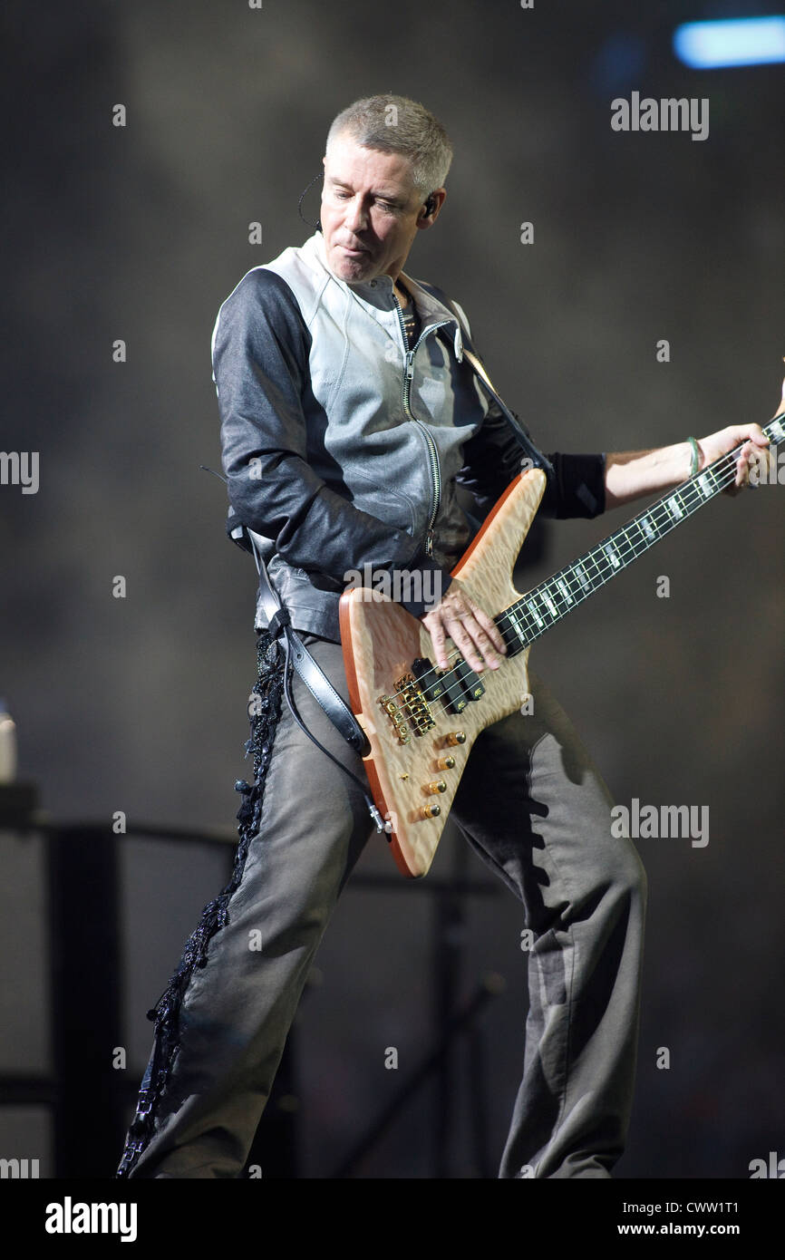 Adam Clayton performing during The U2 360° Tour Stock Photo - Alamy