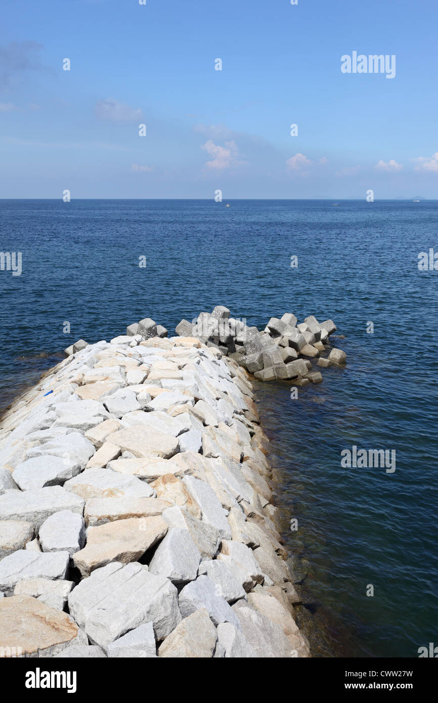 Stone breakwater for protection of coast Stock Photo - Alamy